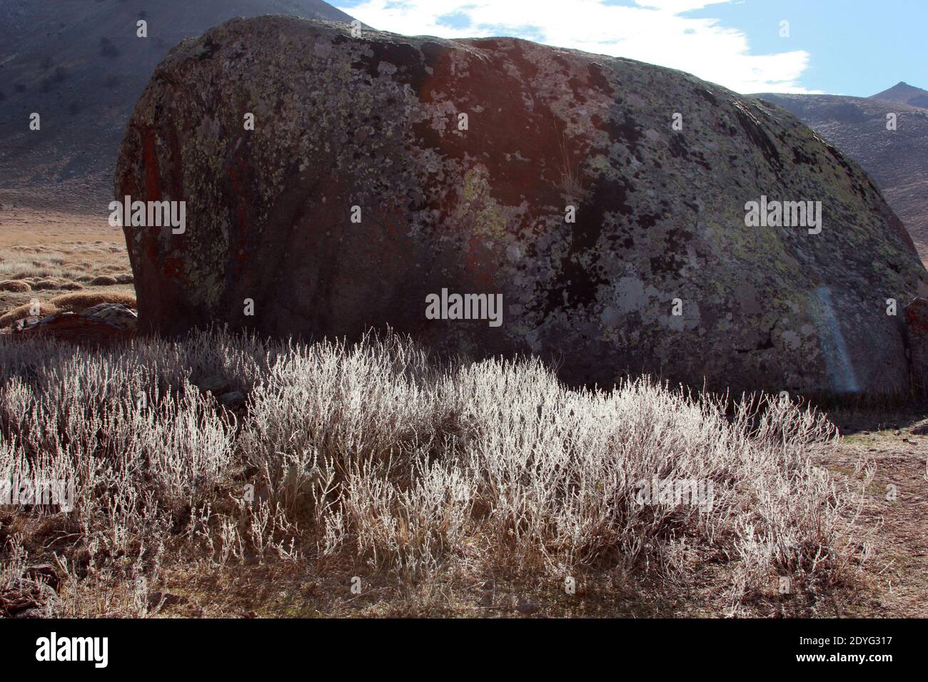 Steppe landscape and big rock. Volcanic trough Stock Photo - Alamy