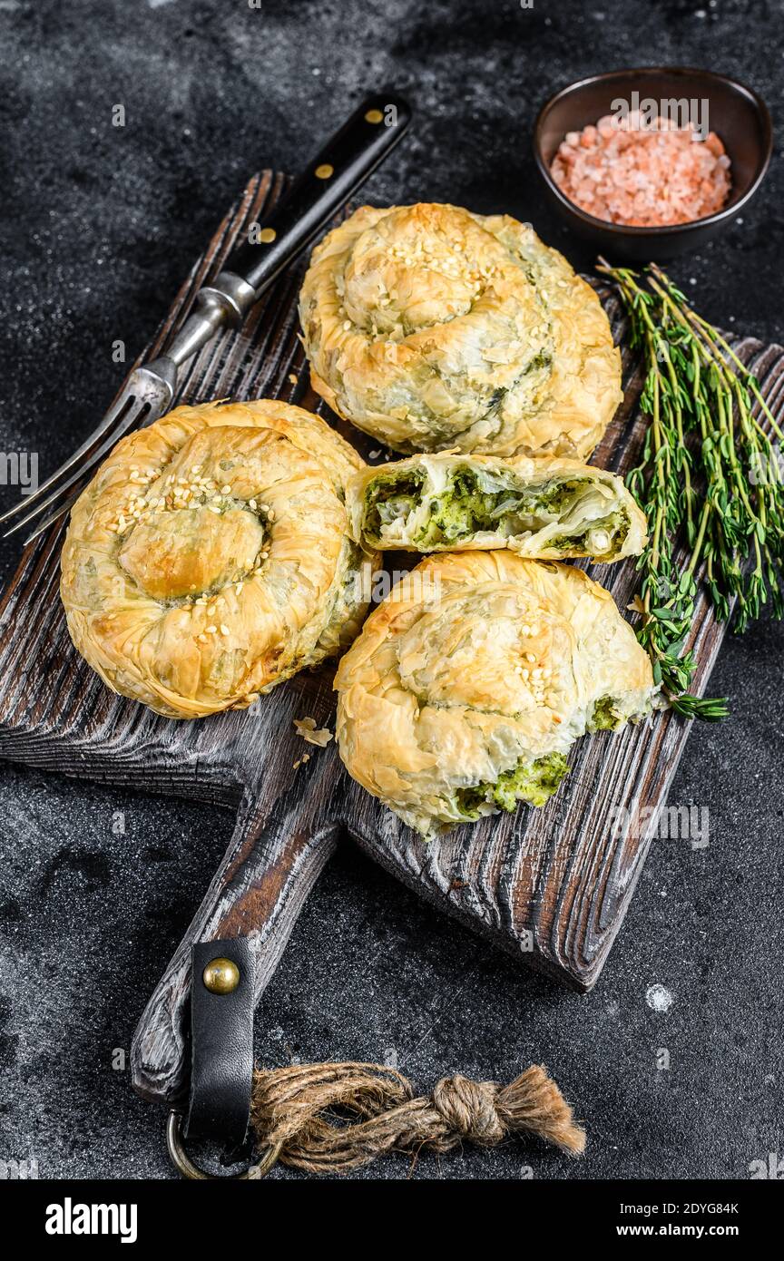 Baked Spanakopita spiral filo pastry puff pie with feta cheese and ...