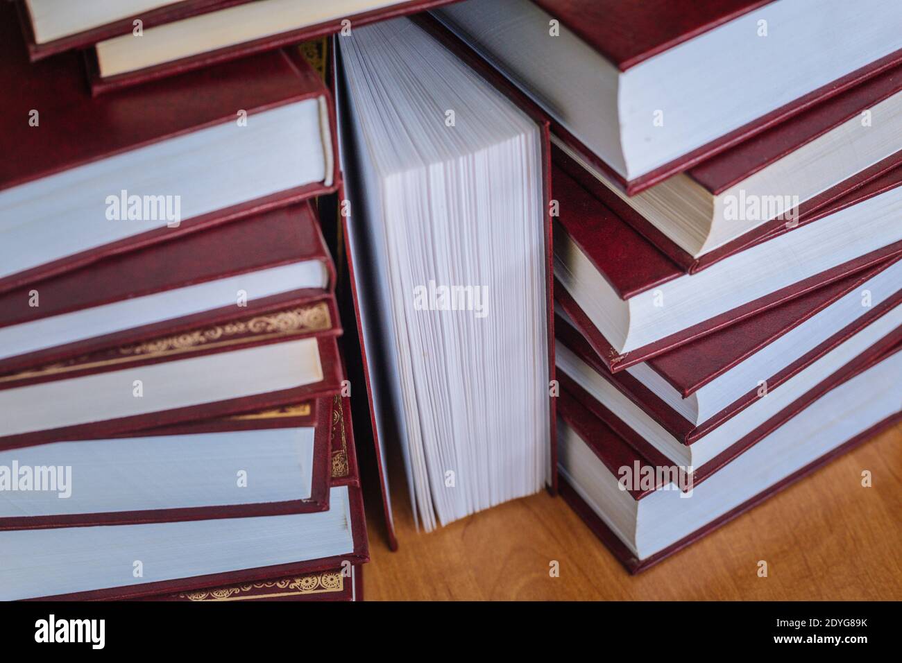 classical literature books stack. Same dust jacket Stock Photo - Alamy