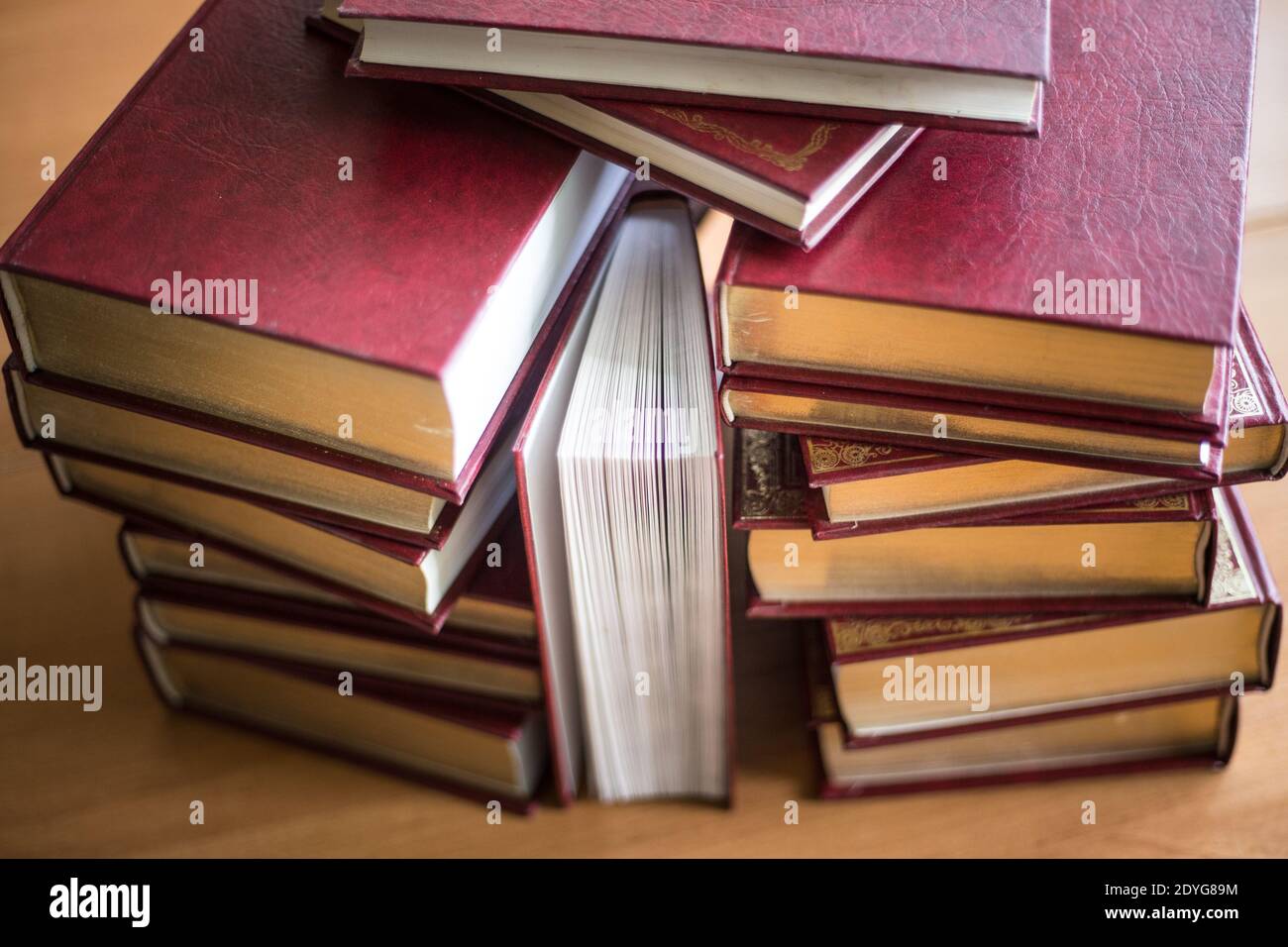 classical literature books stack. Same dust jacket Stock Photo - Alamy