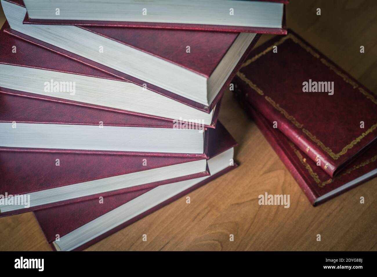 classical literature books stack. Same dust jacket Stock Photo - Alamy