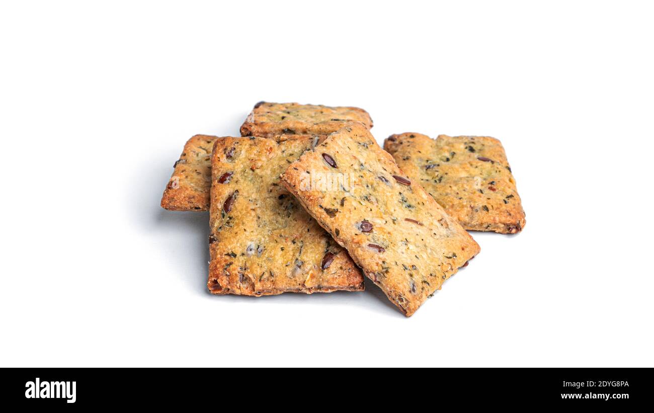 Italian crispbreads with celery, flax seeds and olive oil on a white ...