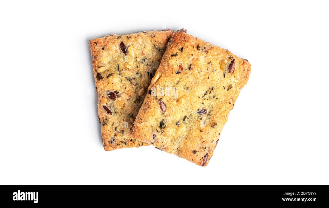 Italian crispbreads with celery, flax seeds and olive oil on a white ...
