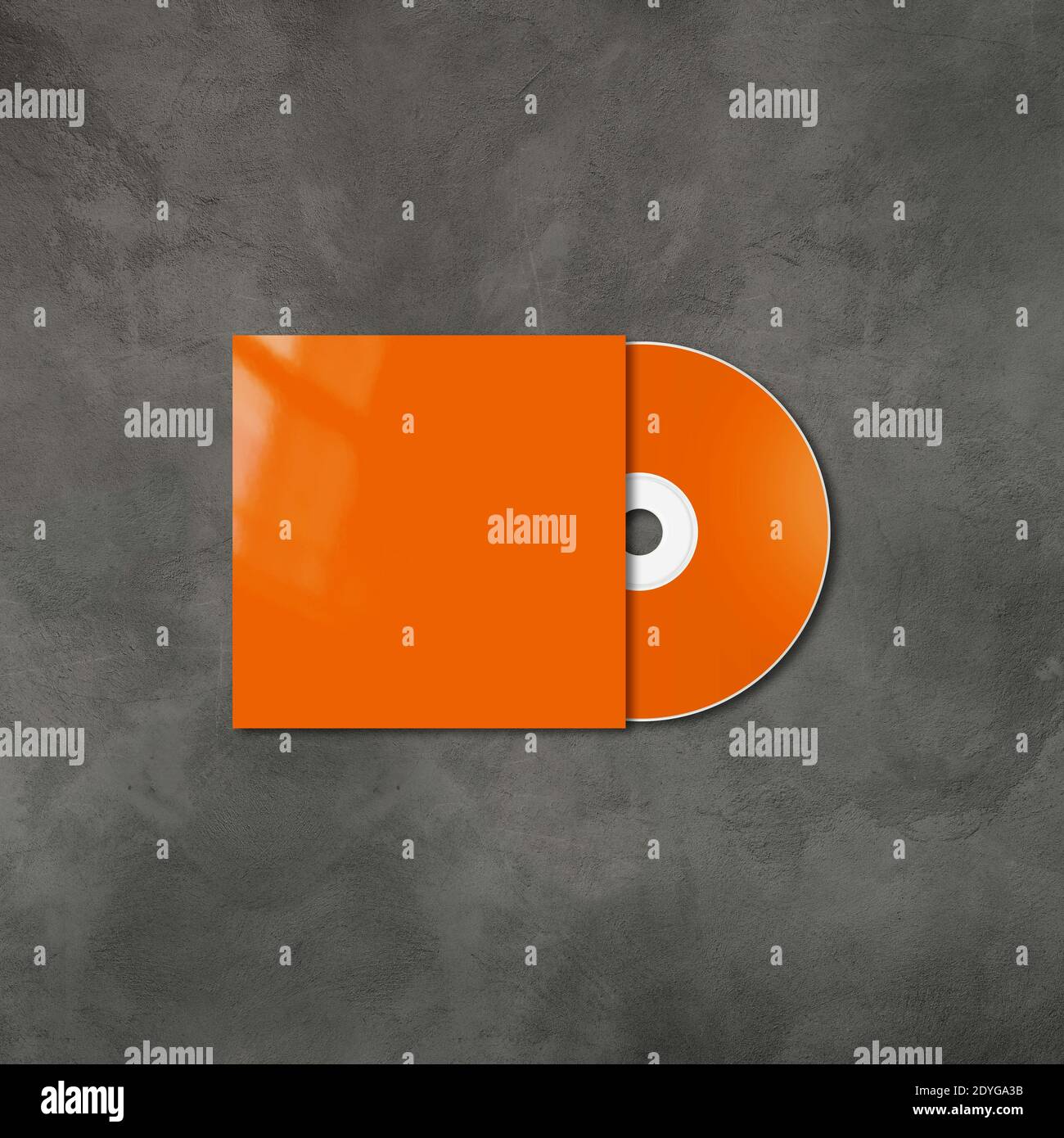 Orange CD - DVD label and cover mockup template isolated on concrete ...