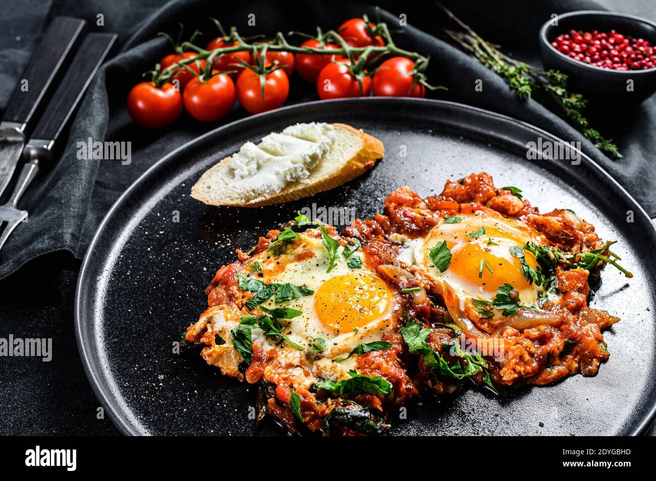 Traditional Israeli Cuisine dishes Shakshuka. Fried egg with tomatoes ...