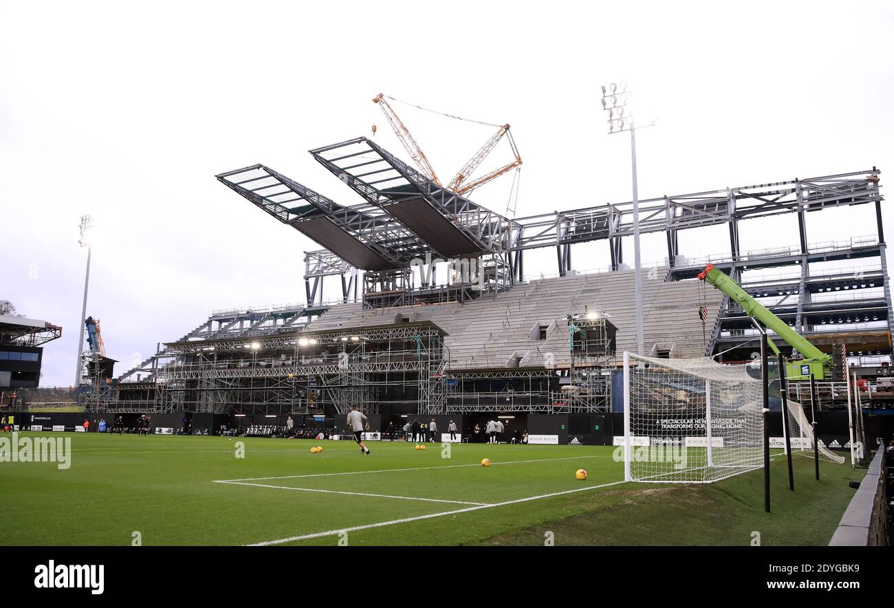 A view of continued works on the Riverside Stand as the players warm up ...