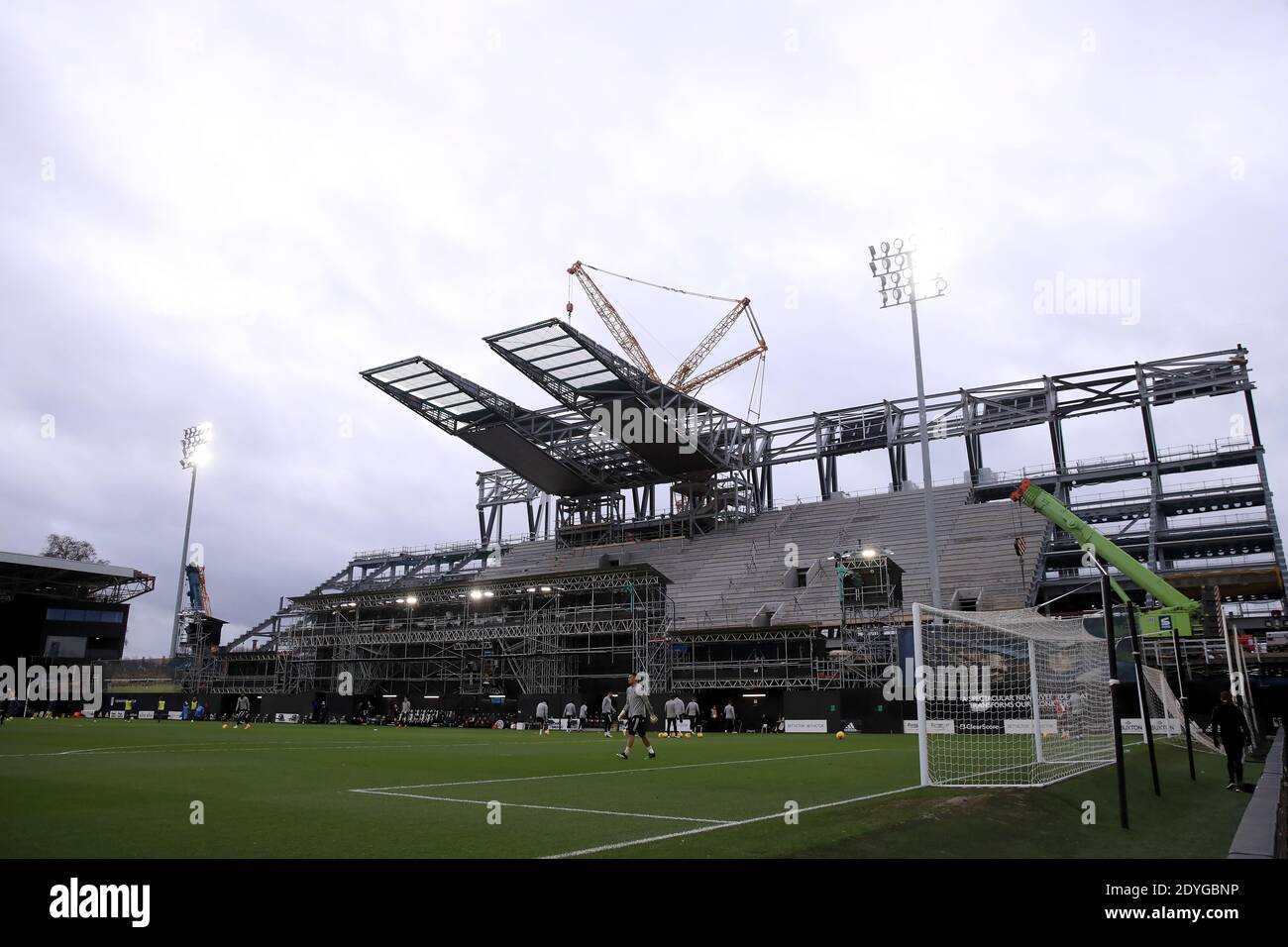 A view of continued works on the Riverside Stand as the players warm up ...