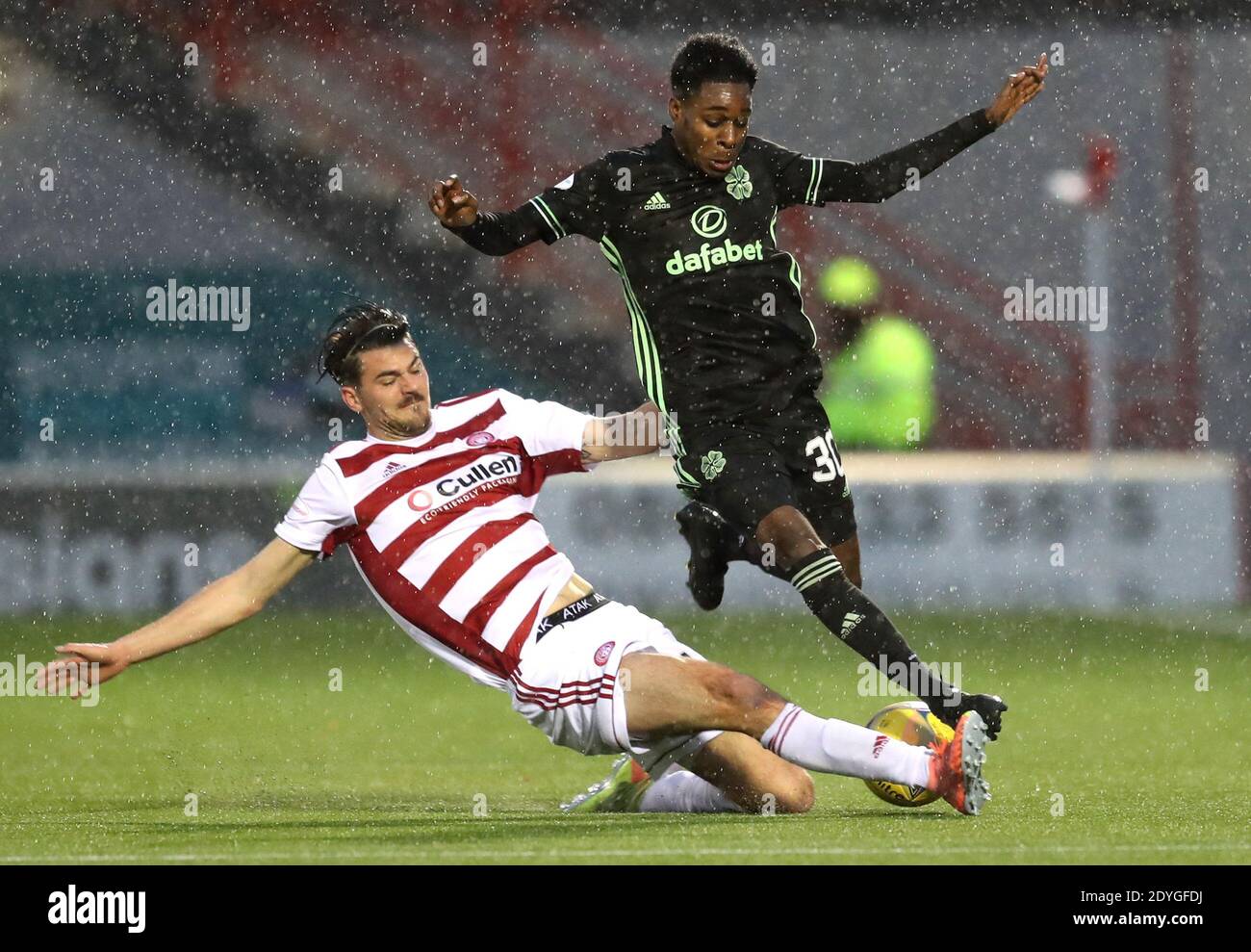Hamilton Academical's Charlie Trafford (left) challenges Celtic's ...