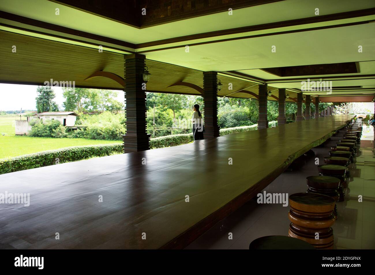 Big and long teak wooden table for thai people and foreign travelers ...