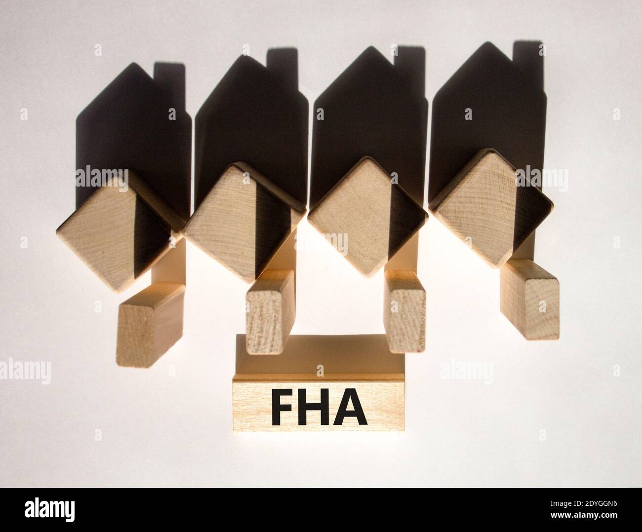 FHA symbol. Houses created by shadows from cubes. The word 'FHA ...