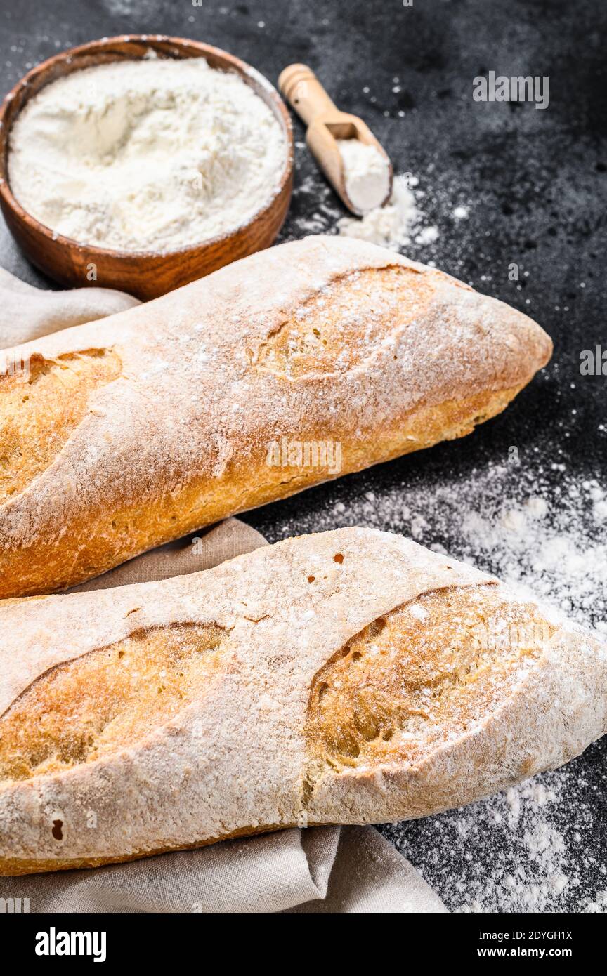Homemade French baguette bread. The concept of cooking bread. black ...