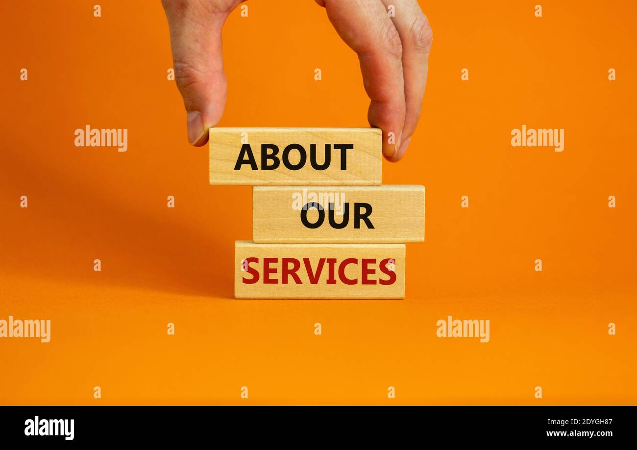 About our services symbol. Wooden blocks tower with words 'about our ...