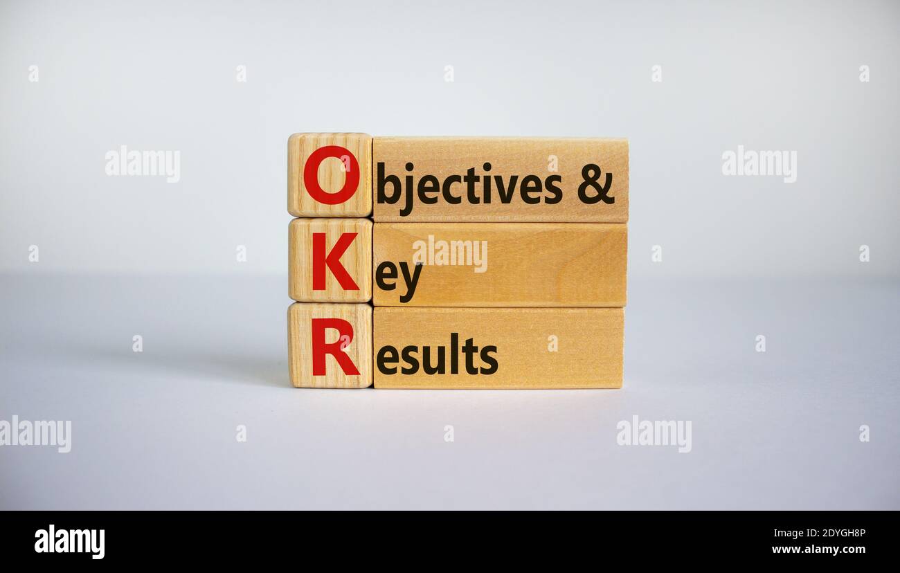 OKR symbol. Concept words 'OKR - objectives and key results' on cubes ...