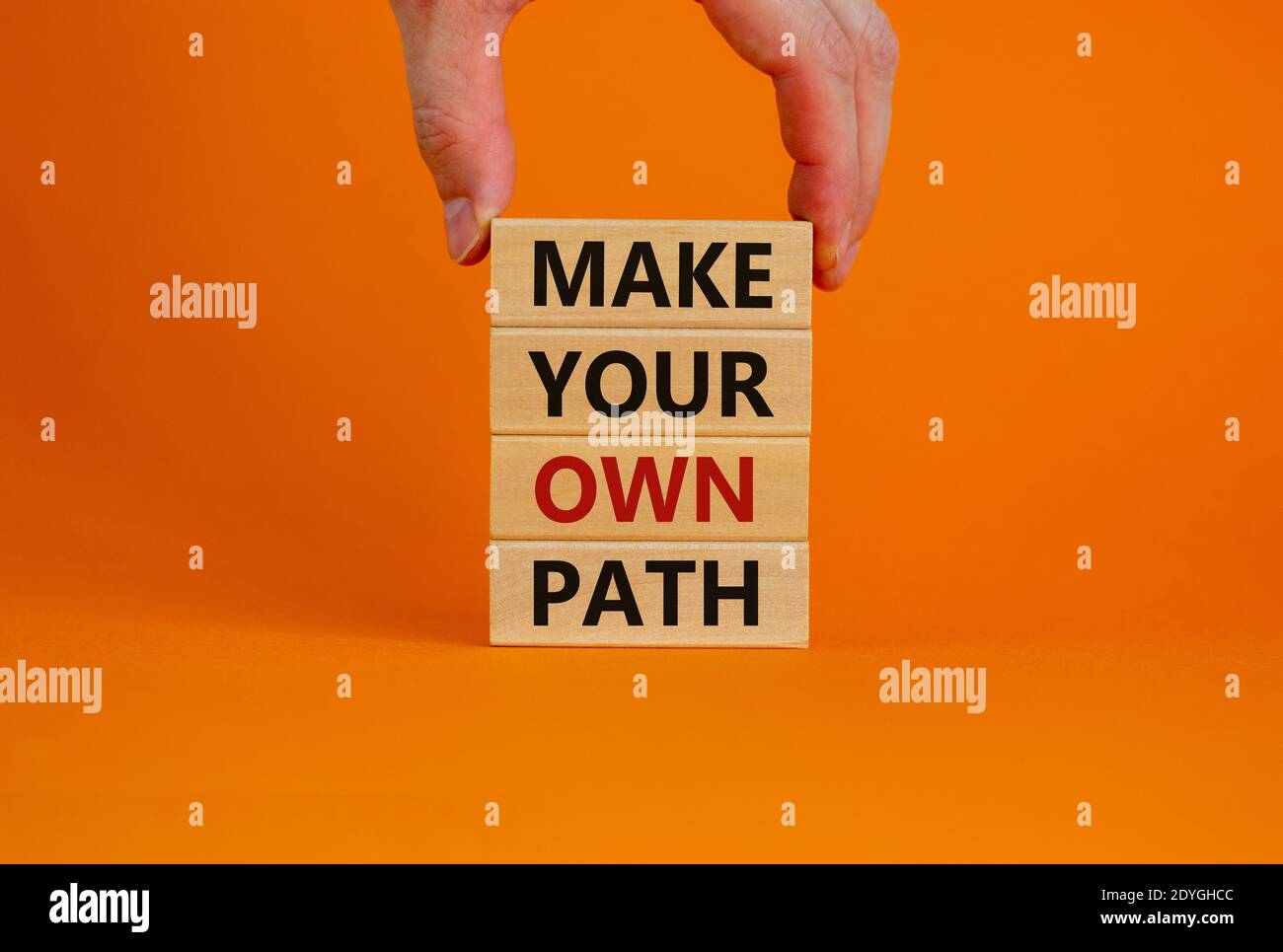 Make your own path symbol. Wooden blocks with words 'Make your own path ...