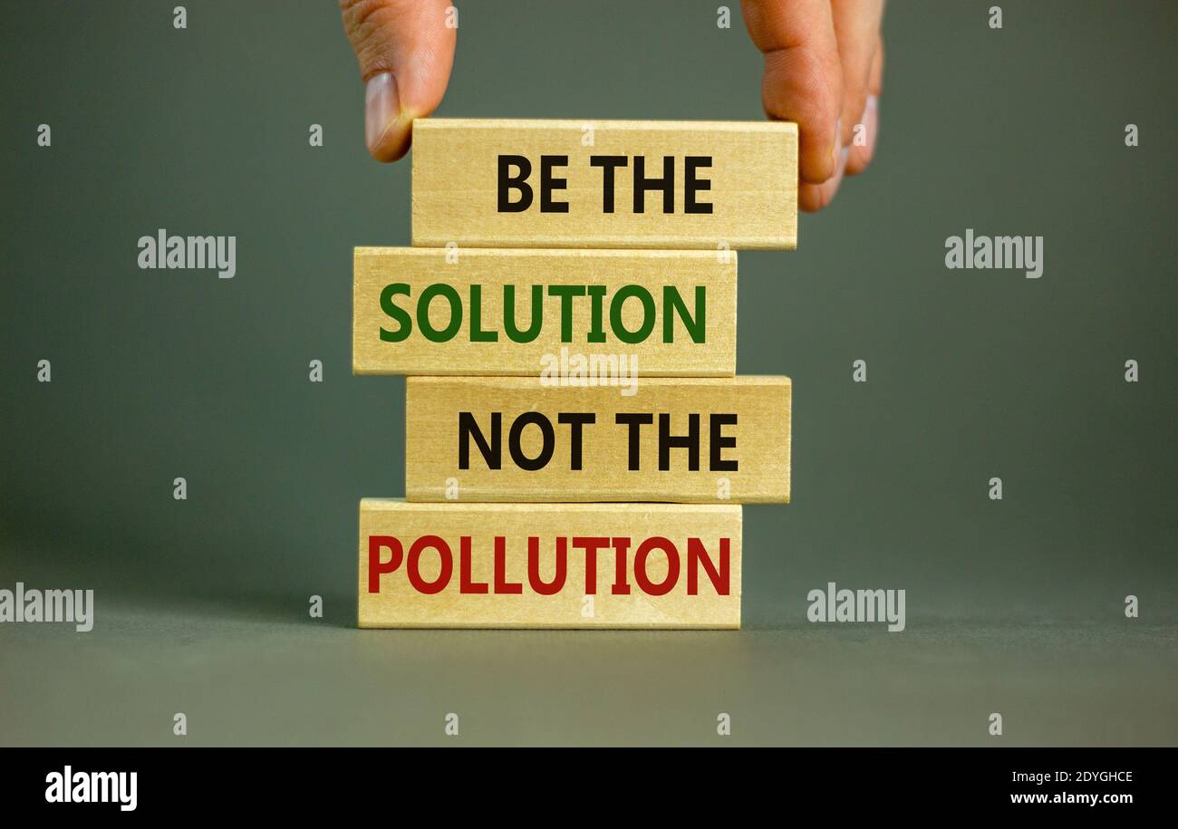 Solution not pollution symbol. Wooden blocks with words 'Be the ...