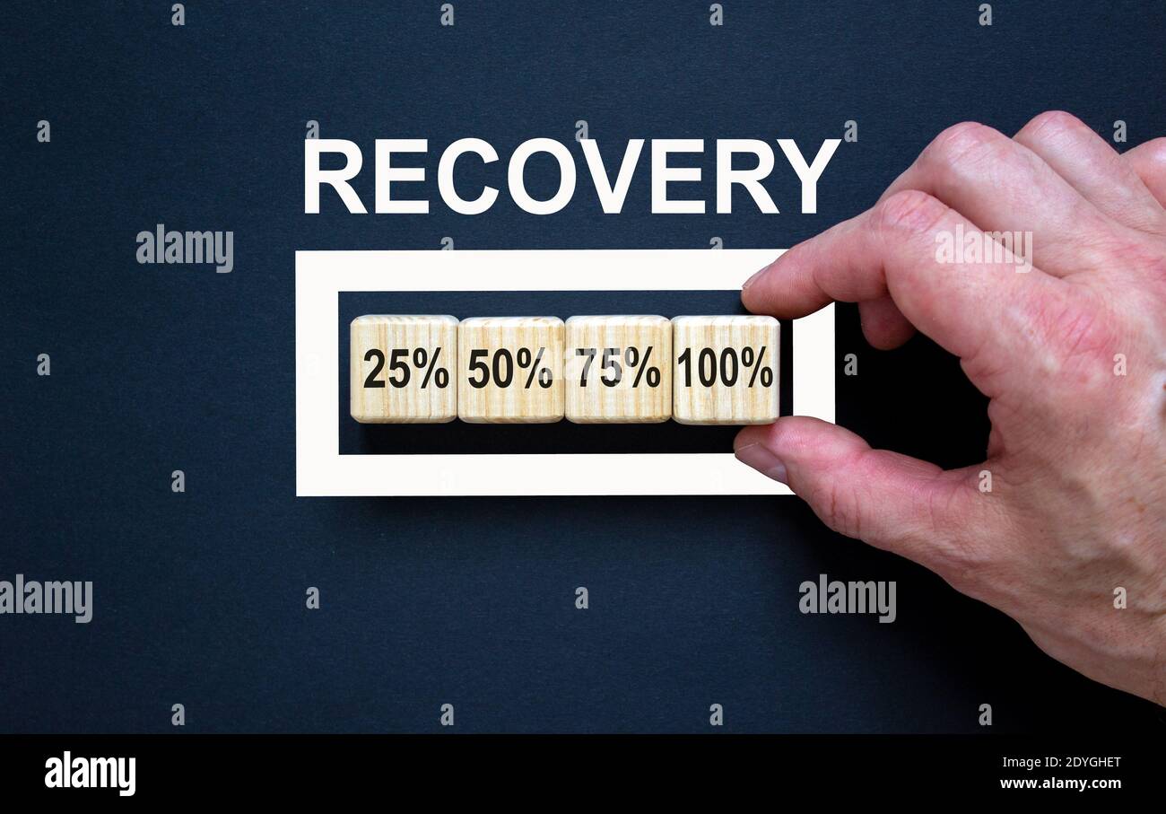 Recovery symbol. Loading percentages with hand putting wood cube in ...