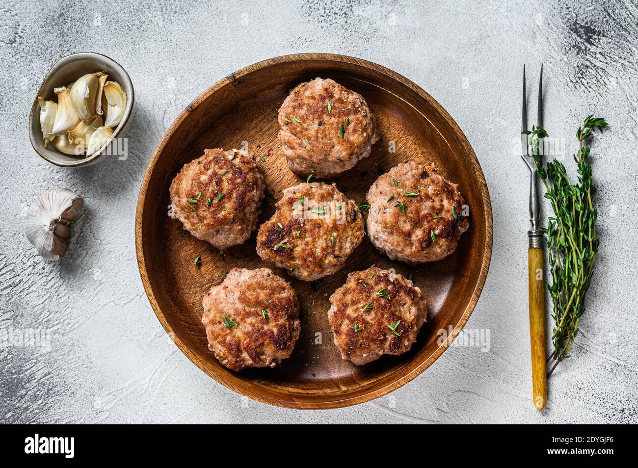 Homemade fried cutlets from beef and pork meat. White background. Top ...