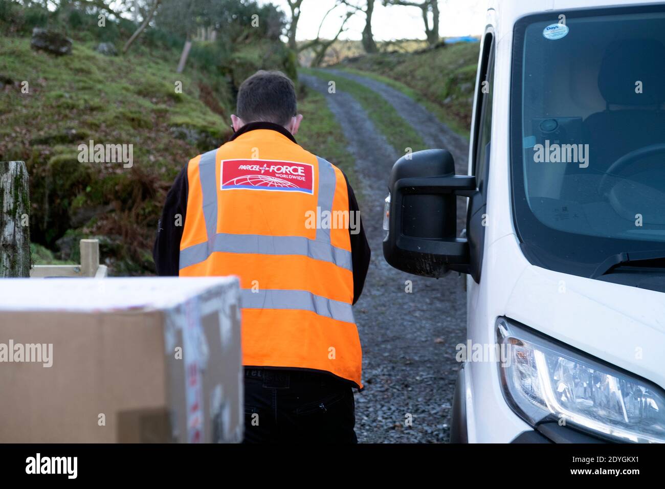Mail delivering parcel hi-res stock photography and images - Alamy