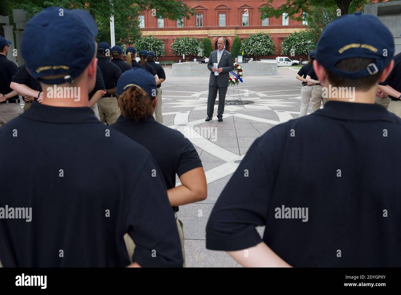 Law enforcement explorers stand in formation observing wreath 3 Stock ...