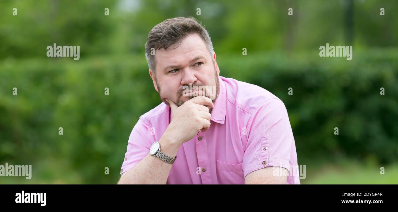 Adult solid man prone to overweight with a beard Stock Photo - Alamy