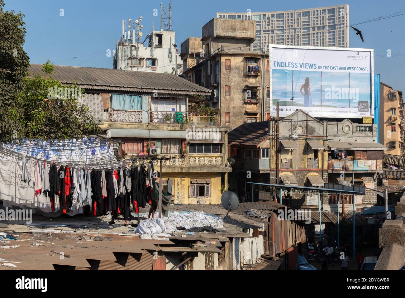 Mumbai India Billboard advertising luxury condos in slum area of Dhobi ...