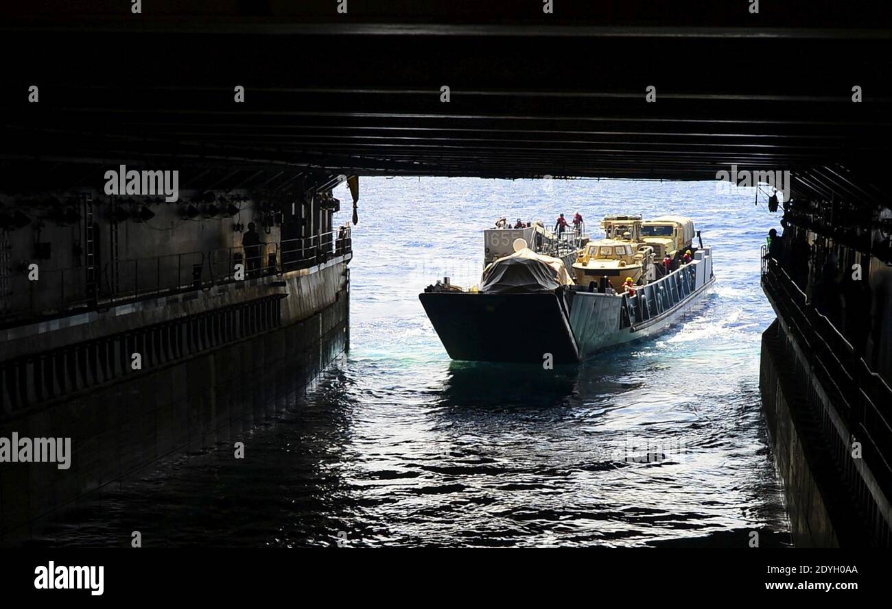 LCU-1655 entering well deck of USS Whidbey Island (LSD-41) 160717 Stock ...