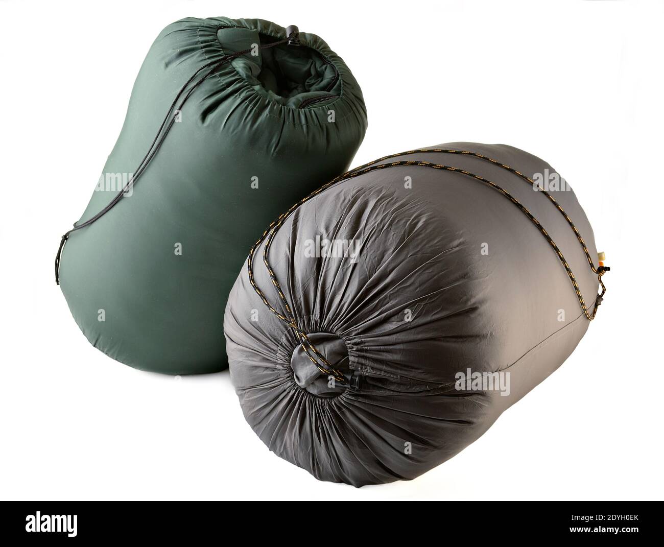 packed tourist sleeping bag on a white background Stock Photo - Alamy