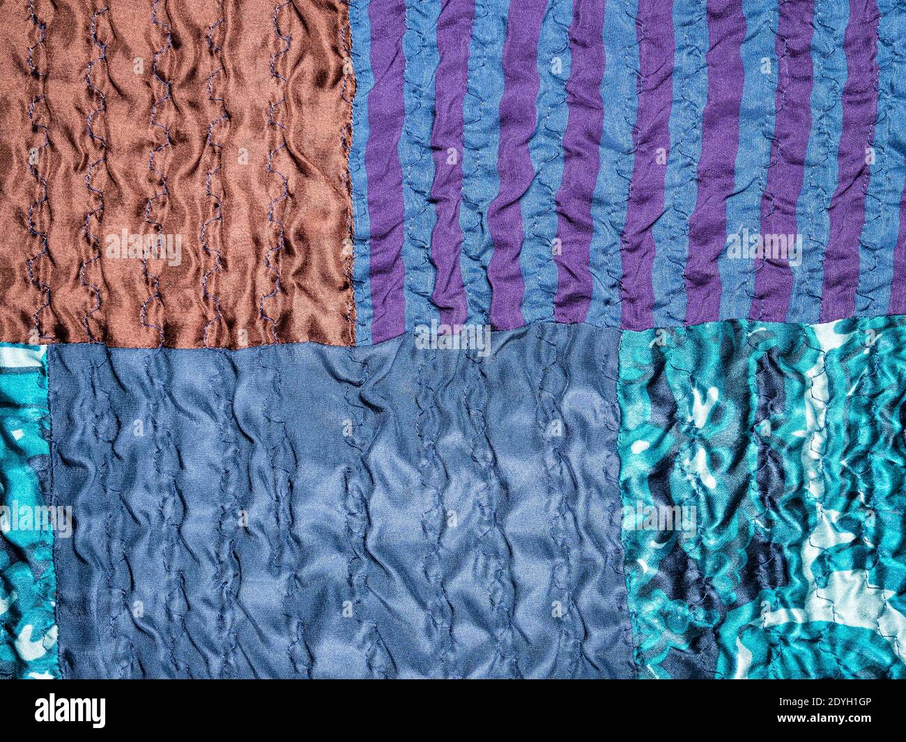 textile background - hand-crafted detail of blue patchwork fabric Stock ...