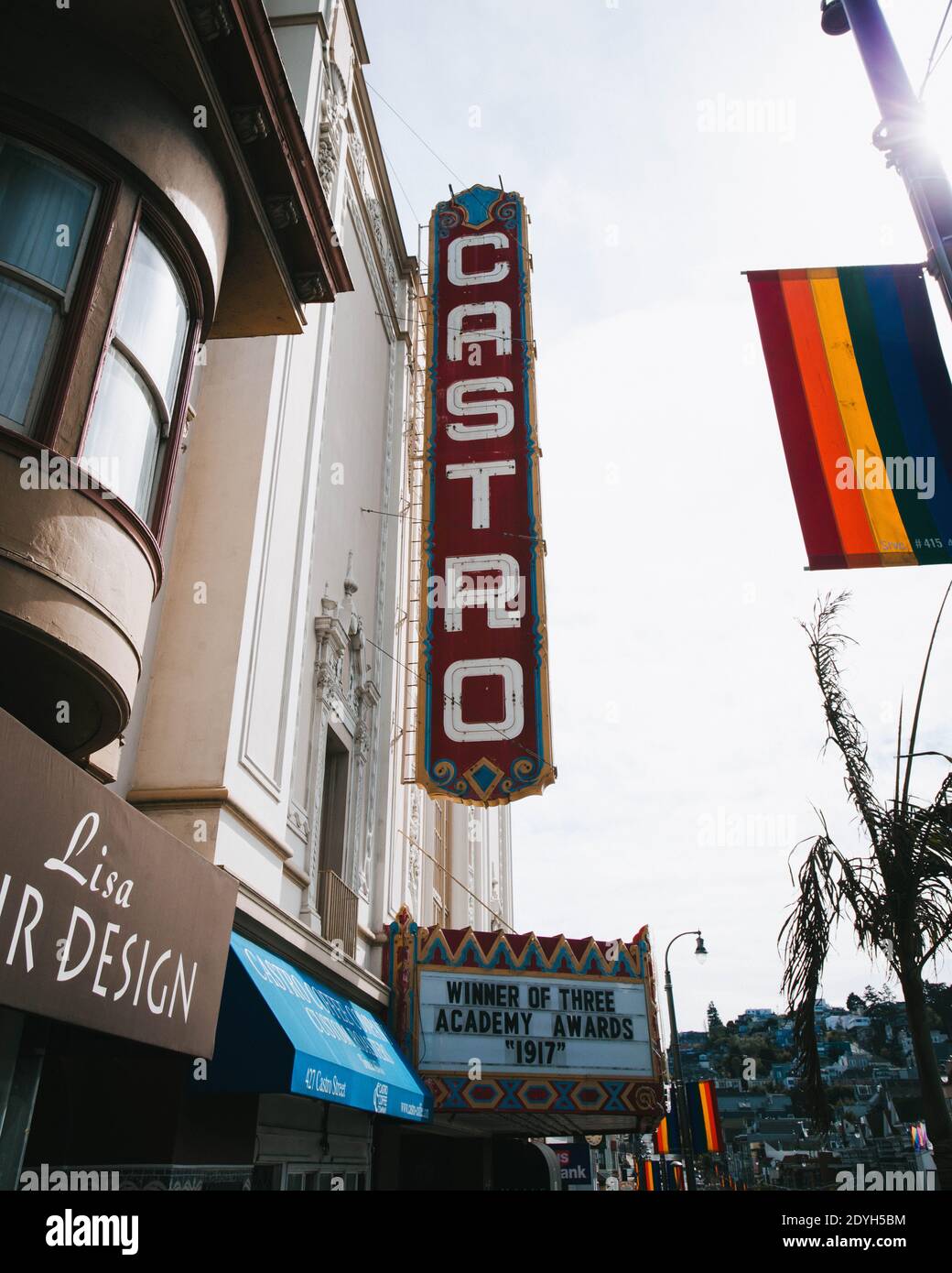 The Castro Theatre sign alongside a rainbow flag in San Francisco's ...