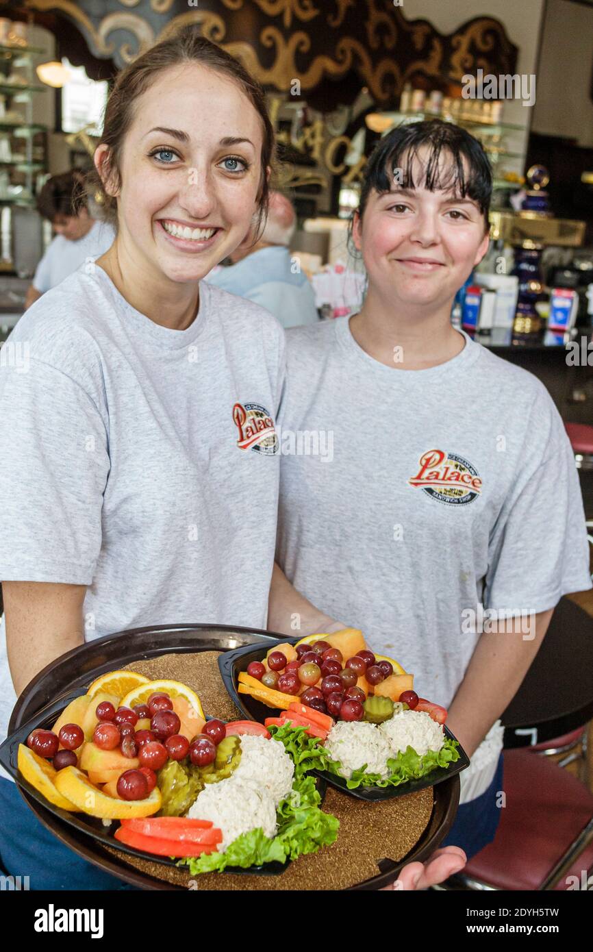 Restaurant waitress server employee tray fruit women hi-res stock ...