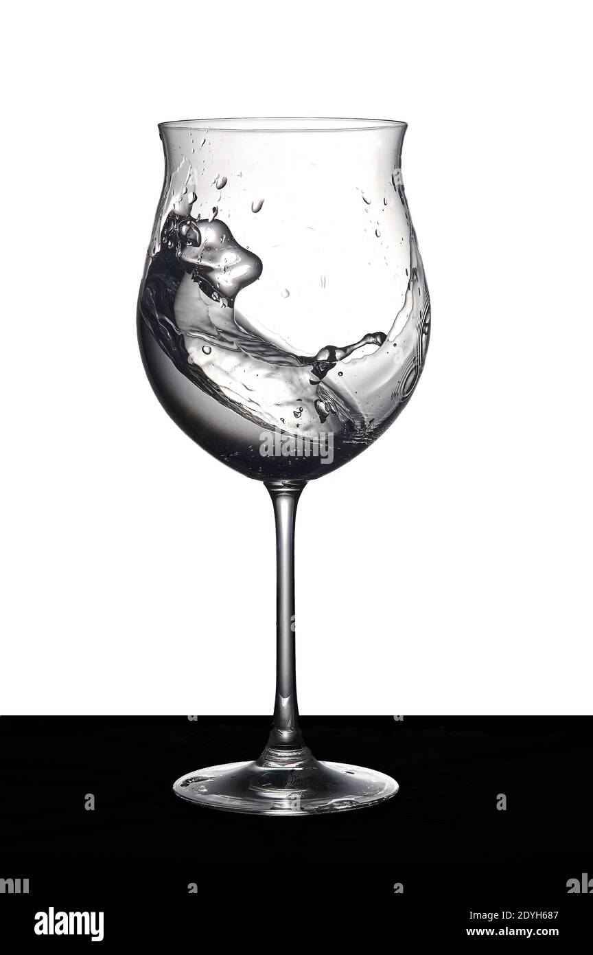 Shaken water in a glass Stock Photo - Alamy