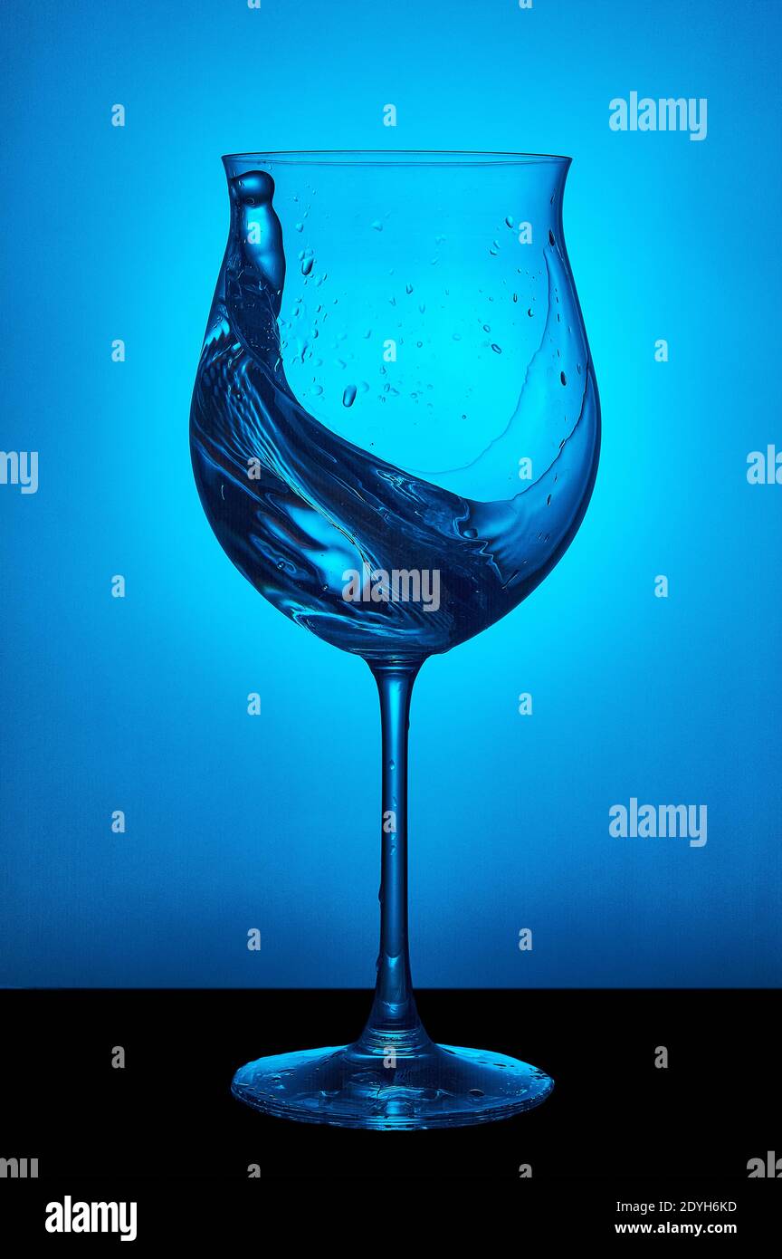 Shaken water in a glass Stock Photo - Alamy