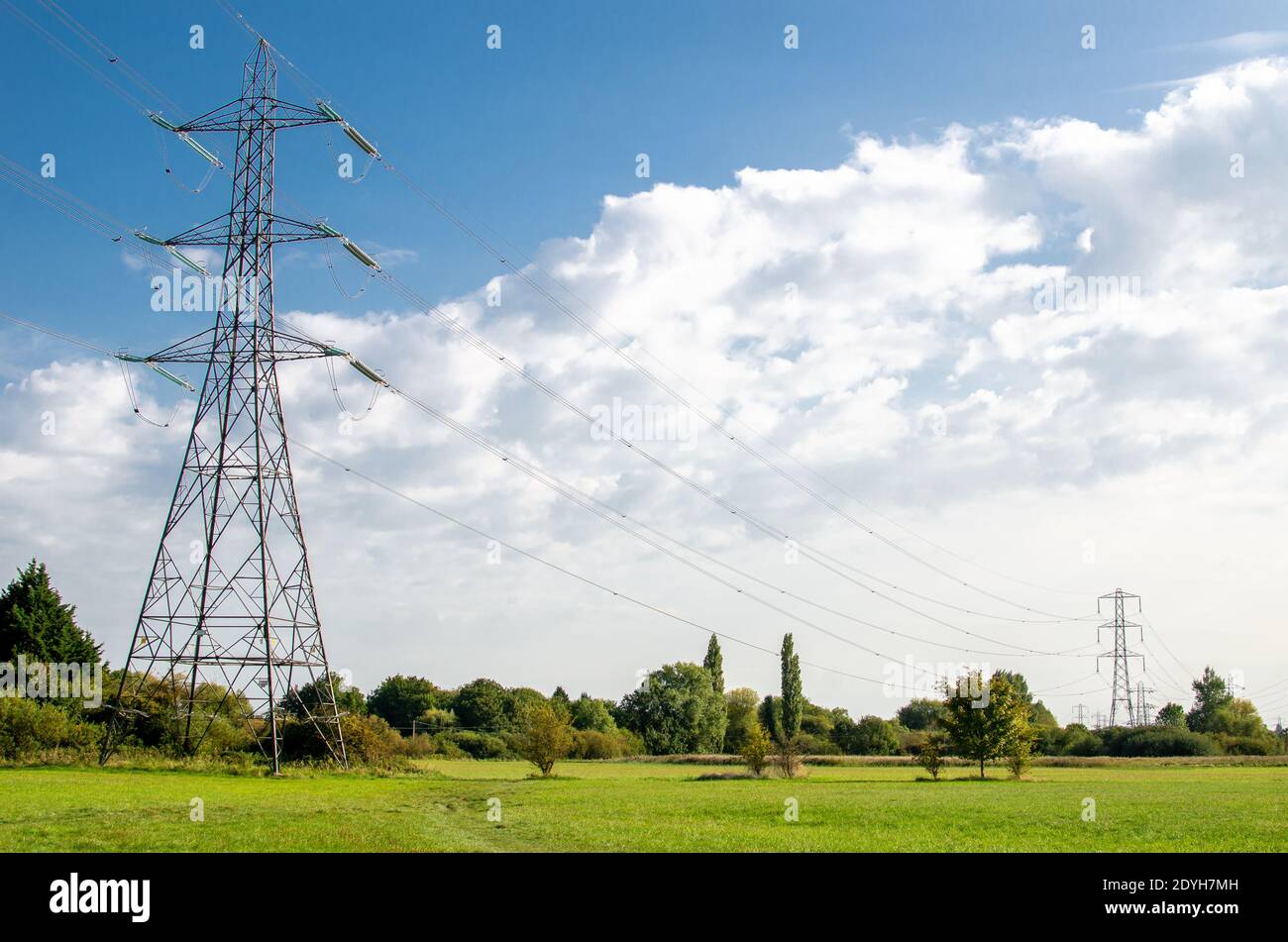 Electricity pylons in the countryside at Chertsey, Surrey, England ...