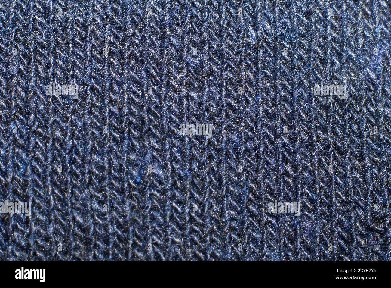 Texture of blue knitted fabric close up Stock Photo - Alamy