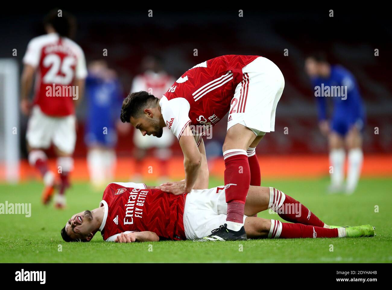 Arsenal's Gabriel Martinelli is checked on by teammate Pablo Mari after ...