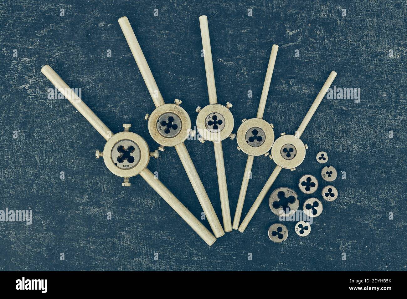 Threading dies, Old used kit for cutting an external thread, close up ...