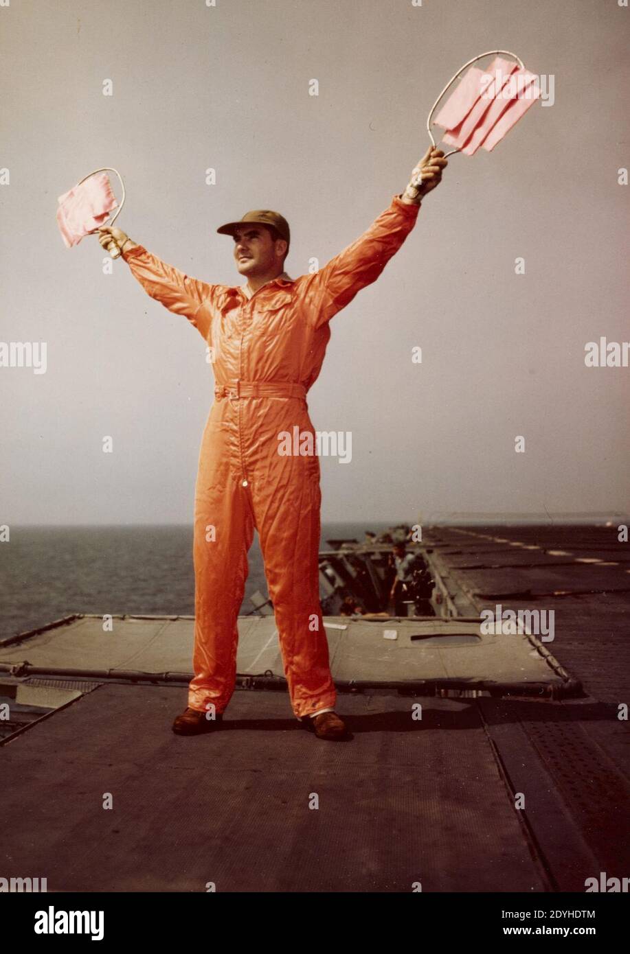 Landing signal officer aboard USS Charger (CVE-30), 6 September 1944 ...