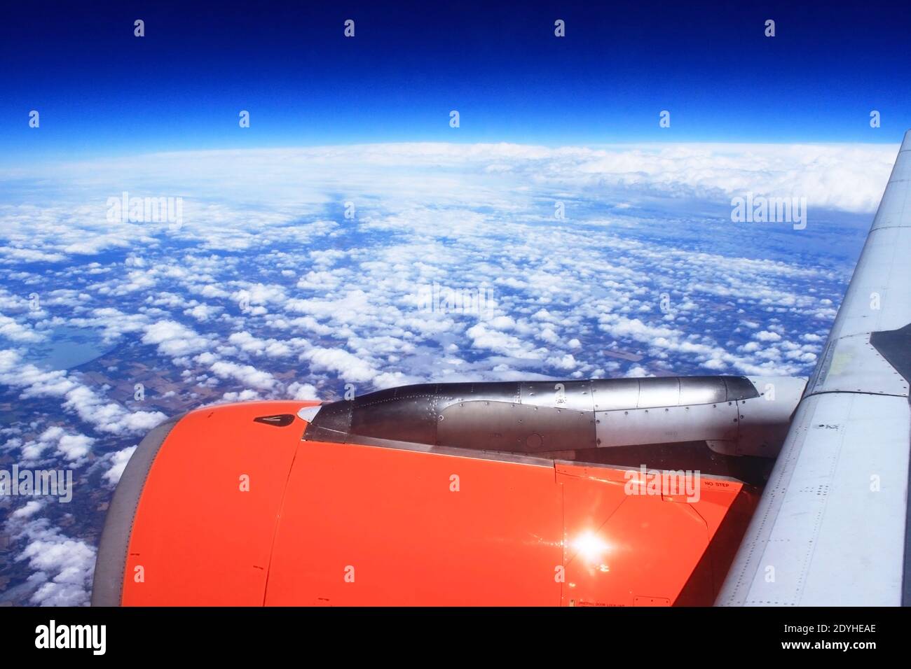 Flying airplane over the clouds and another plane flying in the ...