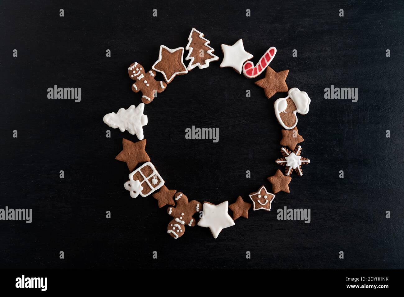 Gingerbread cookies in the shape of a circle on a black background ...