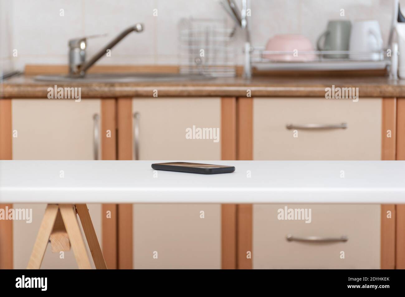 Kitchen interior mobile phone hi-res stock photography and images - Alamy
