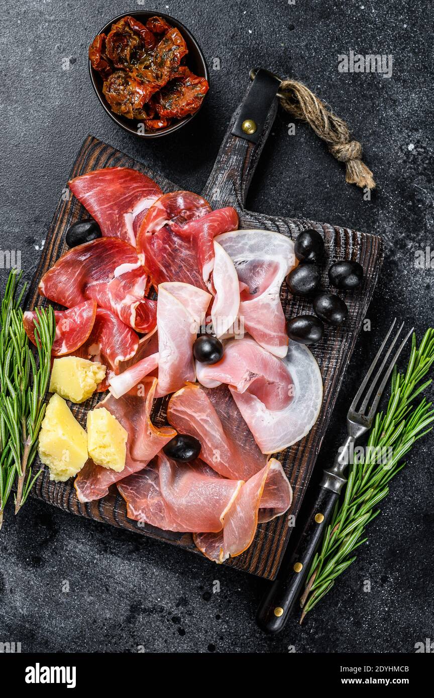 Set of smoked and dried meat Ham, jerky, salted meat, jamon and herbs ...