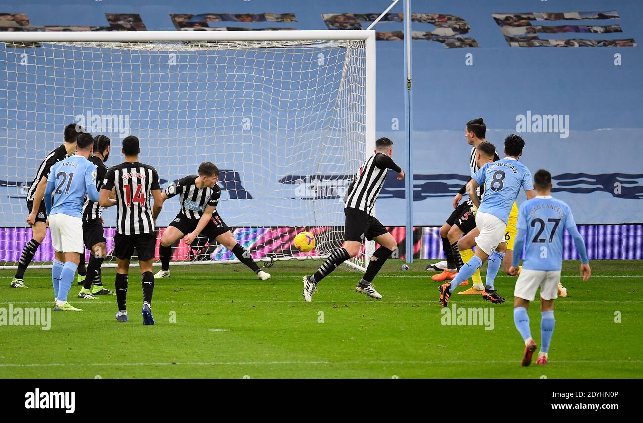 Manchester City's Ilkay Gundogan scores his side's first goal of the ...