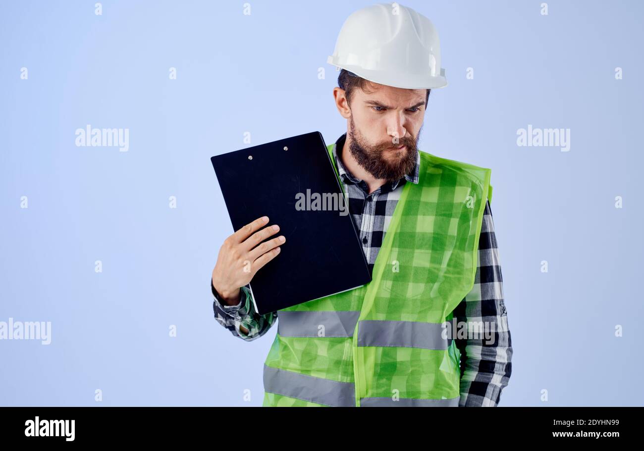 man in builder uniform white helmet professional construction work ...