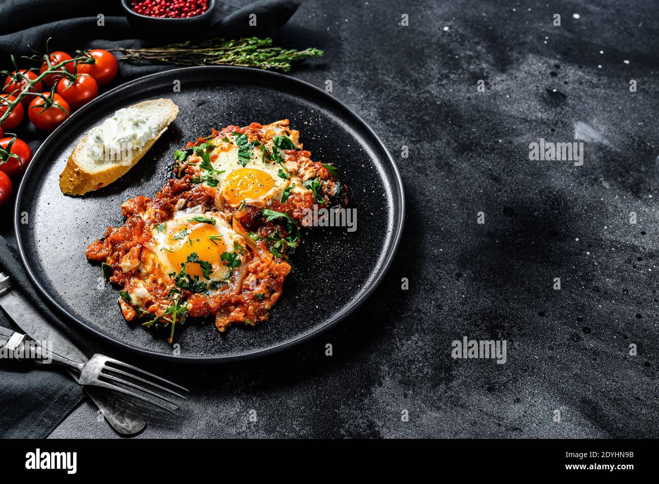 Traditional Israeli Cuisine dishes Shakshuka. Fried egg with tomatoes ...