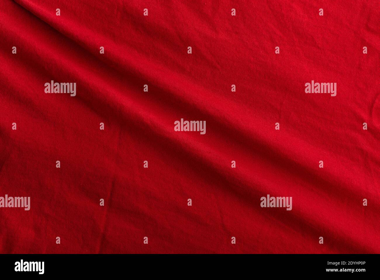 Abstract red textile background. Scarlet pleated fabric Stock Photo - Alamy