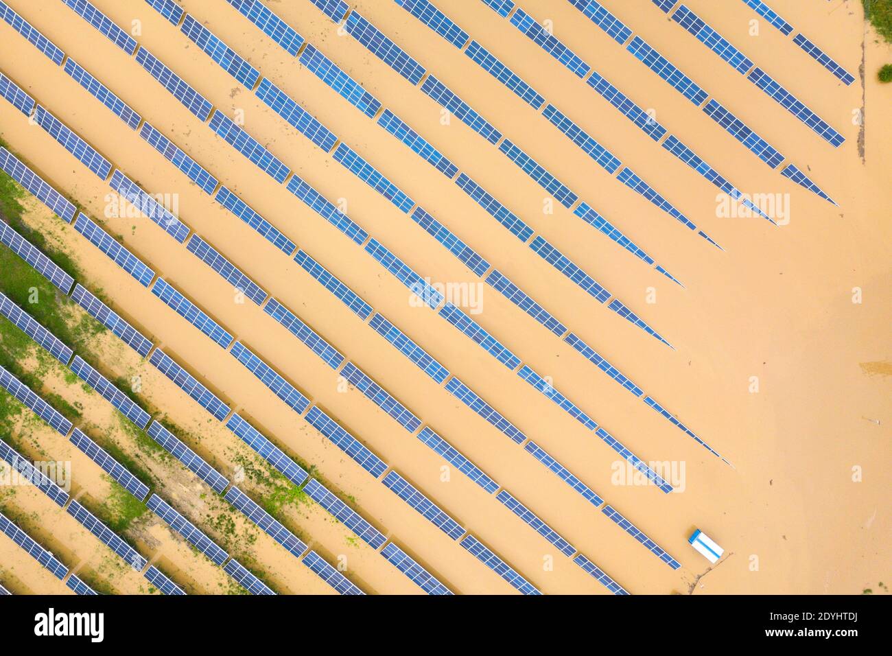 Aerial view of flooded solar power station with dirty river water in ...
