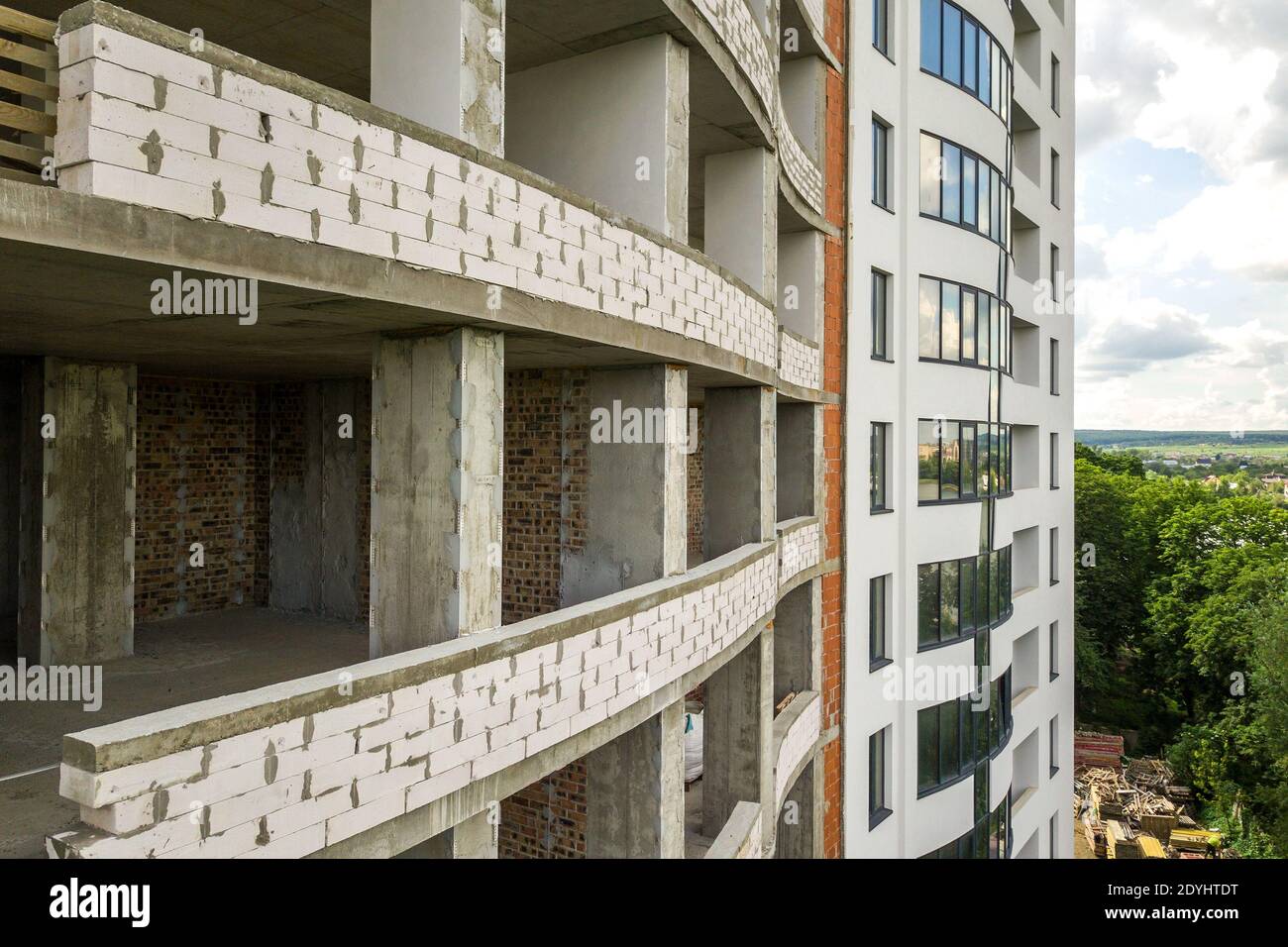 Many windows on new apartment building facade under construction Stock ...