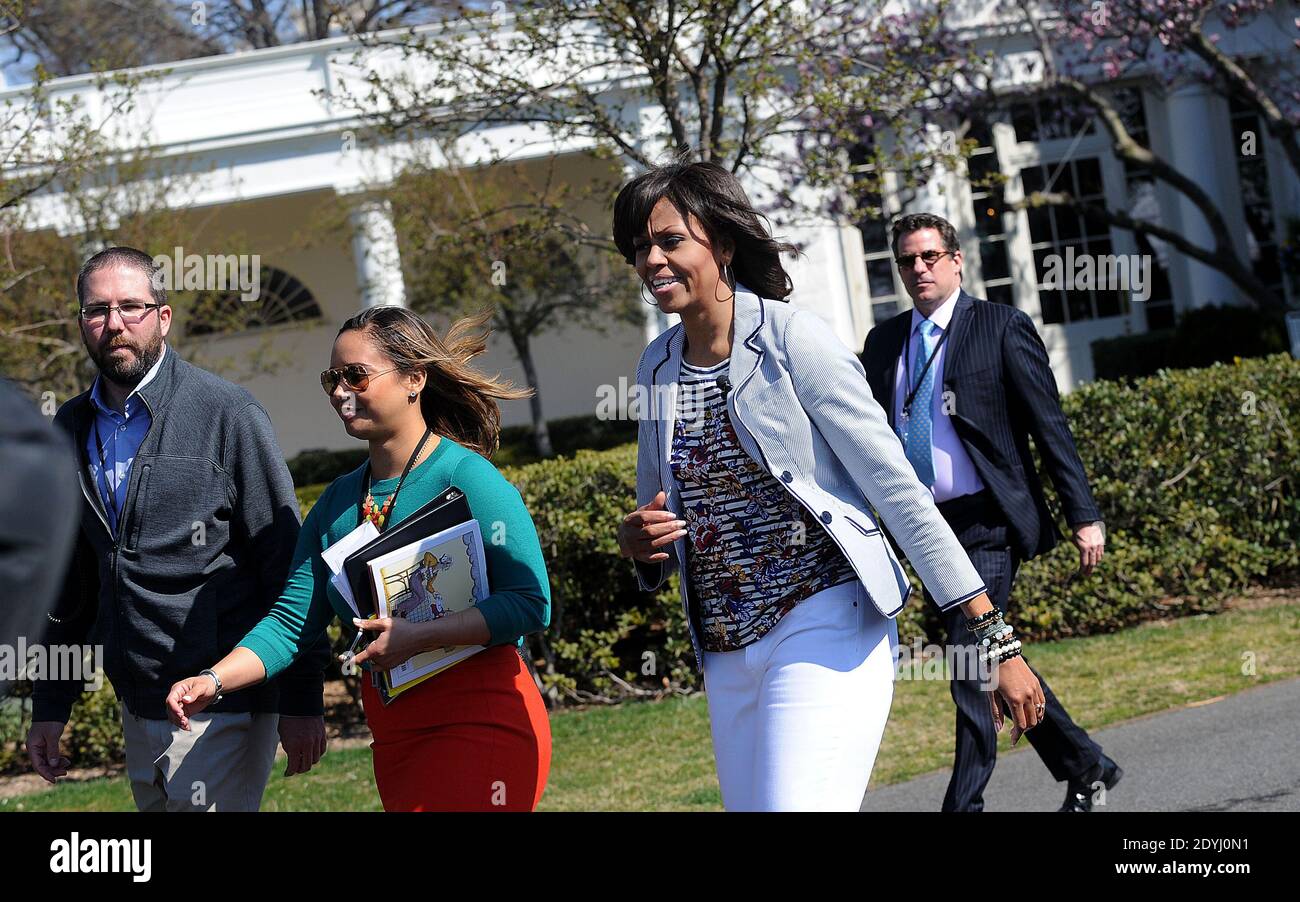 First Lady Michelle Obama walks during the White House Easter Egg Roll ...