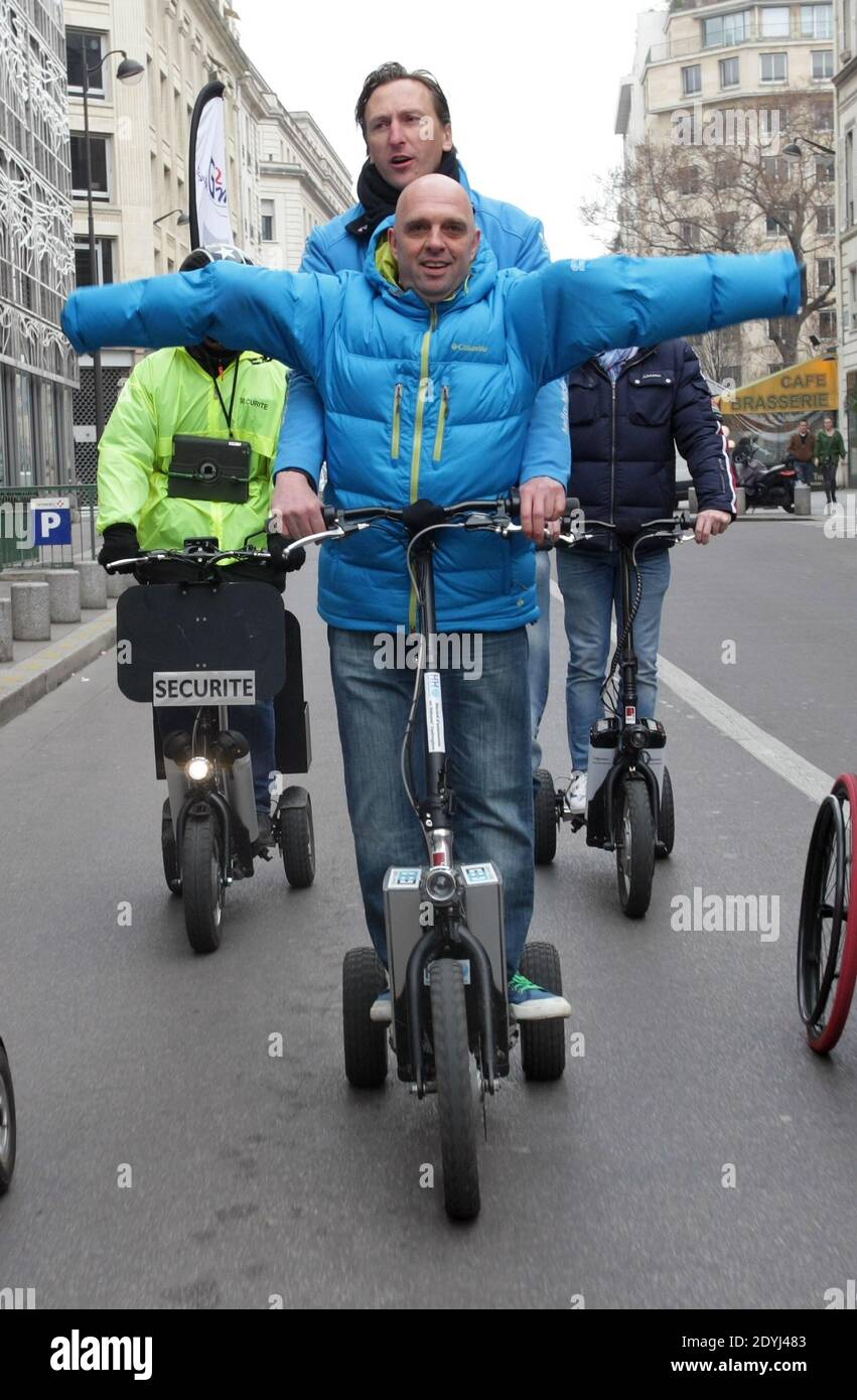 French four-member amputee swimmer Philippe Croizon rides a 'Bikeboard ...