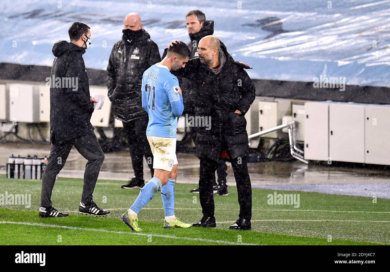 Manchester City manager Pep Guardiola embraces Ferran Torres after he ...